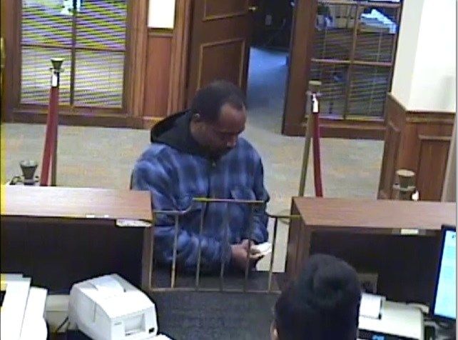 Police release photos of suspect in First National Bank robbery - WFMJ.com