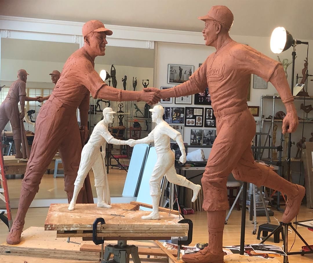 Artist gives update on Shuba-Robinson handshake statue - WFMJ.com