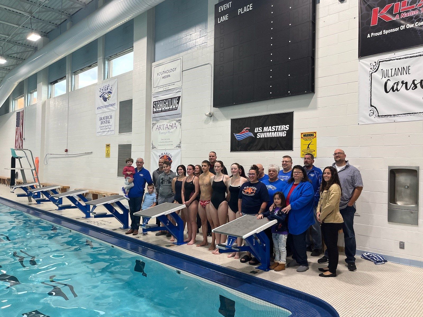 Donors take inaugural dive off of newly-purchased diving blocks at ...