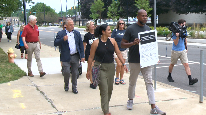 Rally attendees plea to save Realty Building following deadly explosion ...